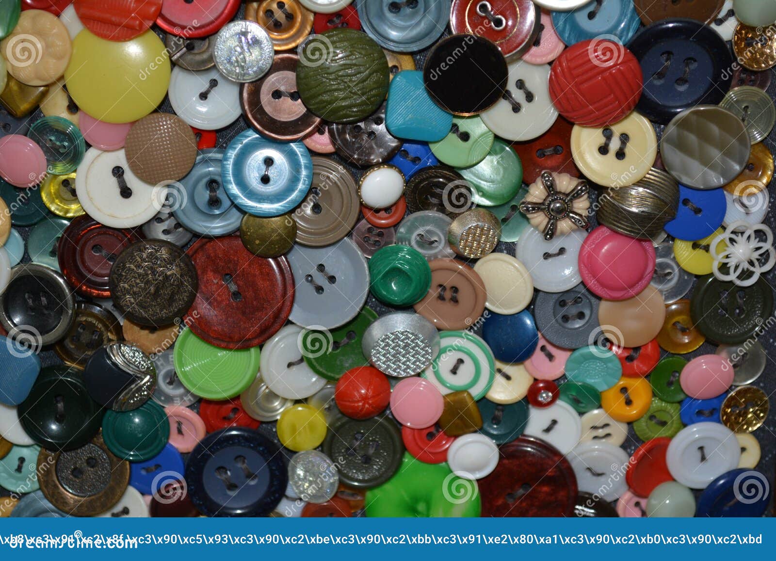 Close Up of a Panel of Multicolored Buttons Sewn on the Fabric. Stock ...