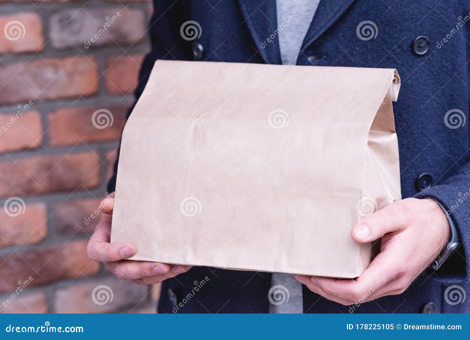 Close-up Paper Package for Delivery in Male Hands. Express Delivery ...