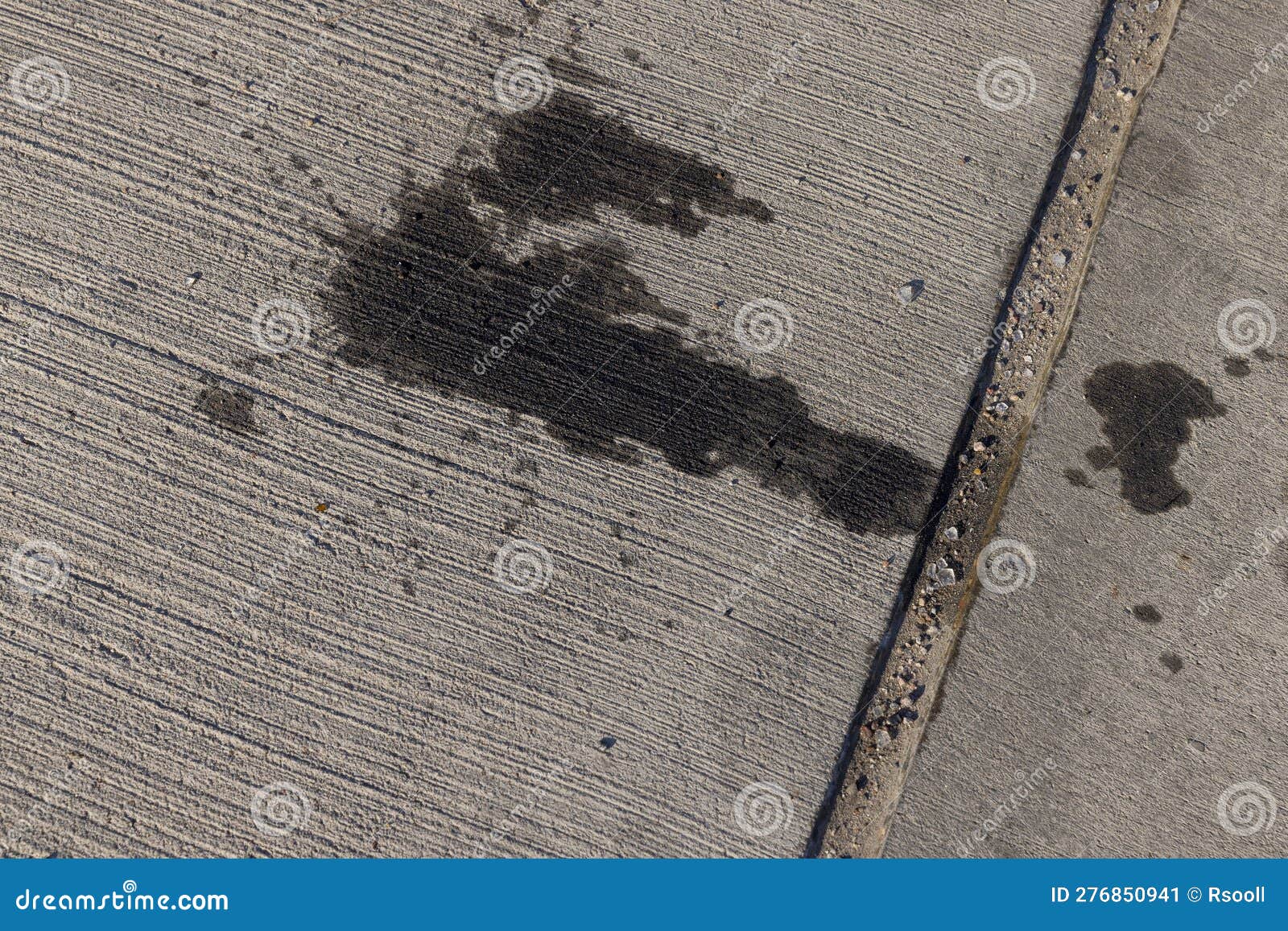 Close-up of a Part of a Concrete Road in Engine Oil Stains Stock Image ...