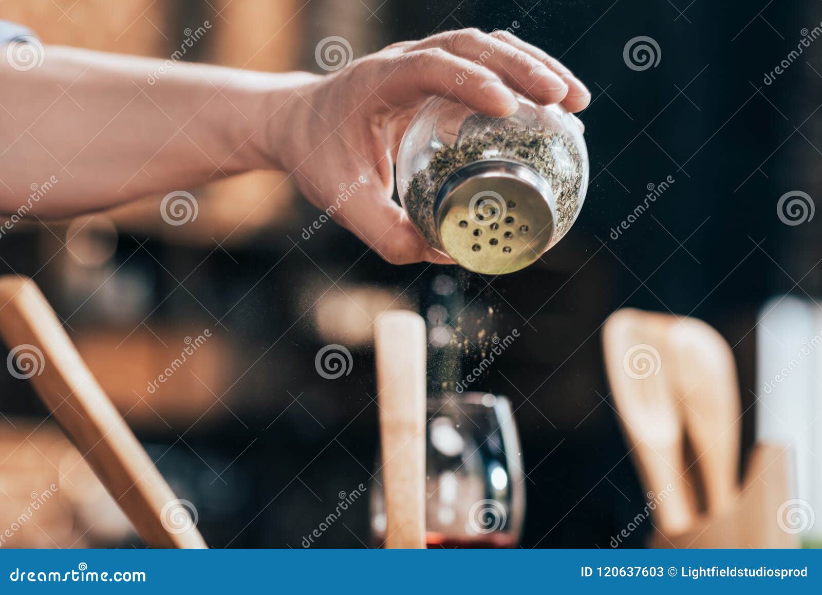 Close-up Partial View of Person Adding Spices while Stock Image - Image ...
