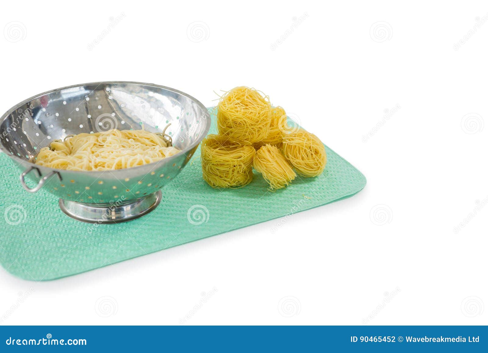 Close Up of Pasta in Colander with Tagliolini on Place Mat Stock Photo ...