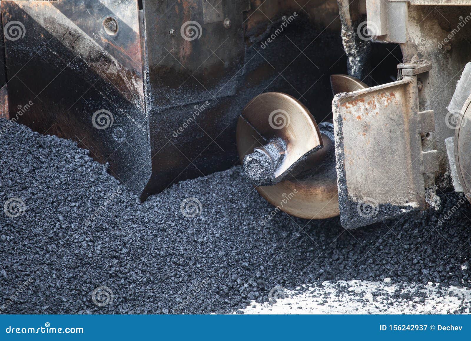 Close Up of Pavement Machine Laying Fresh Asphalt or Bitumen. Road ...