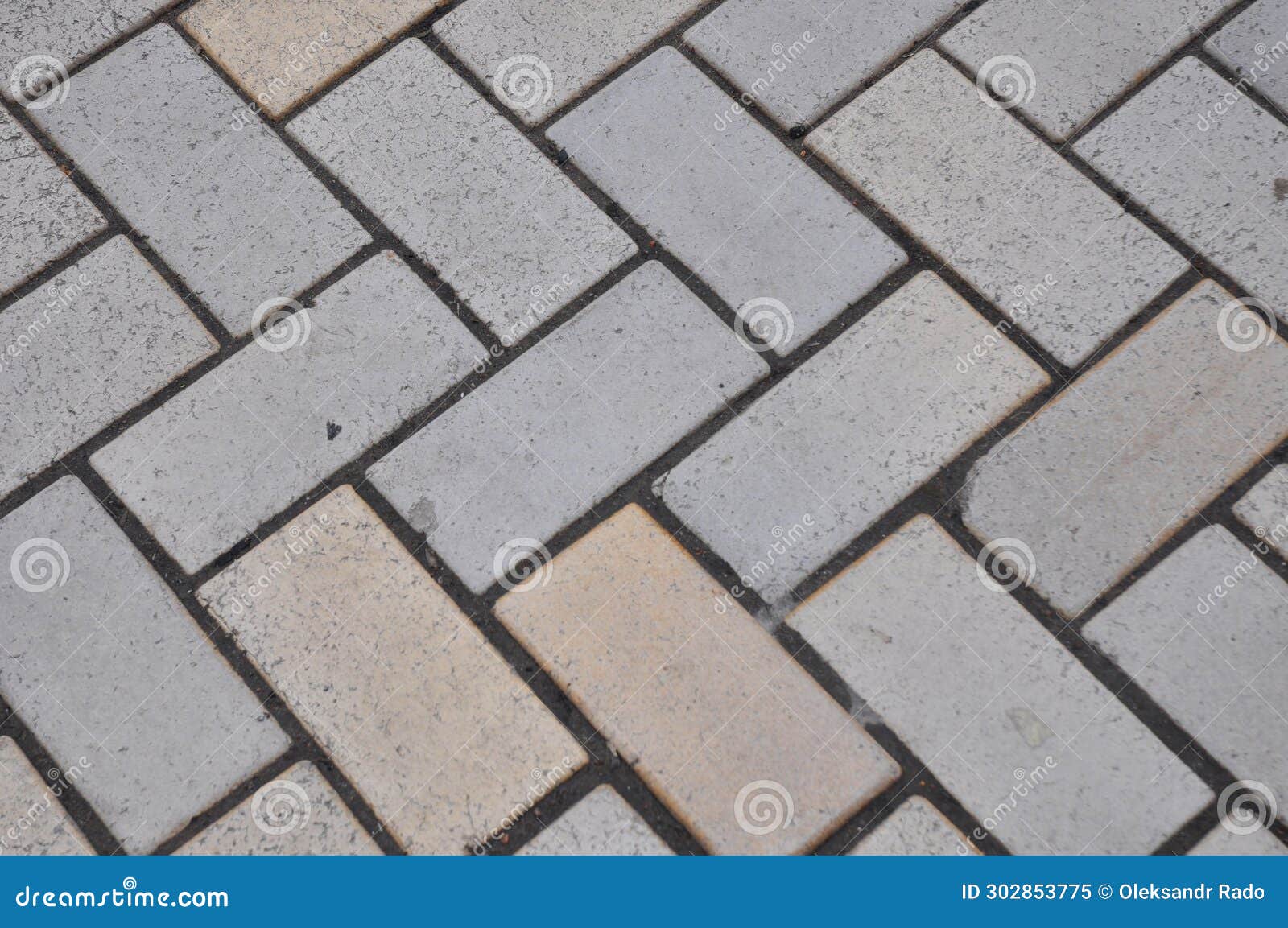 A Close Up of a Paving Herringbone Pattern Background As a Common Paver ...