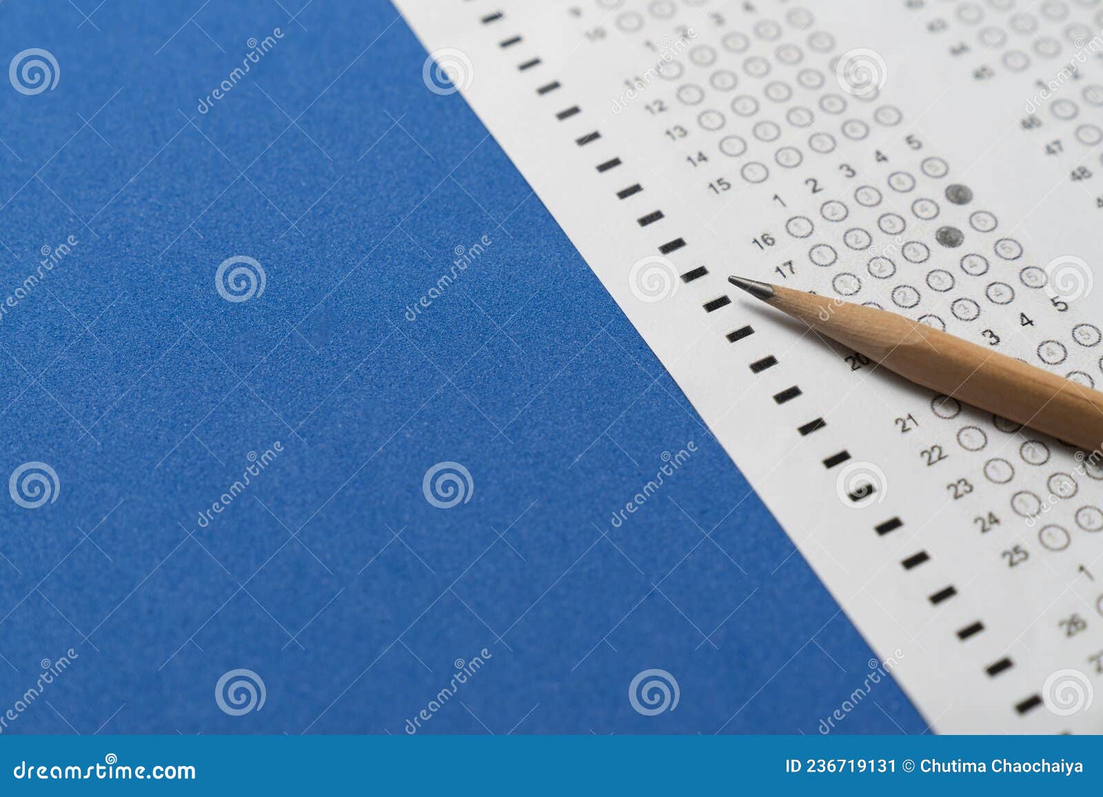 Pencil on Answer Sheets on Blue Table Background, Education Concept ...