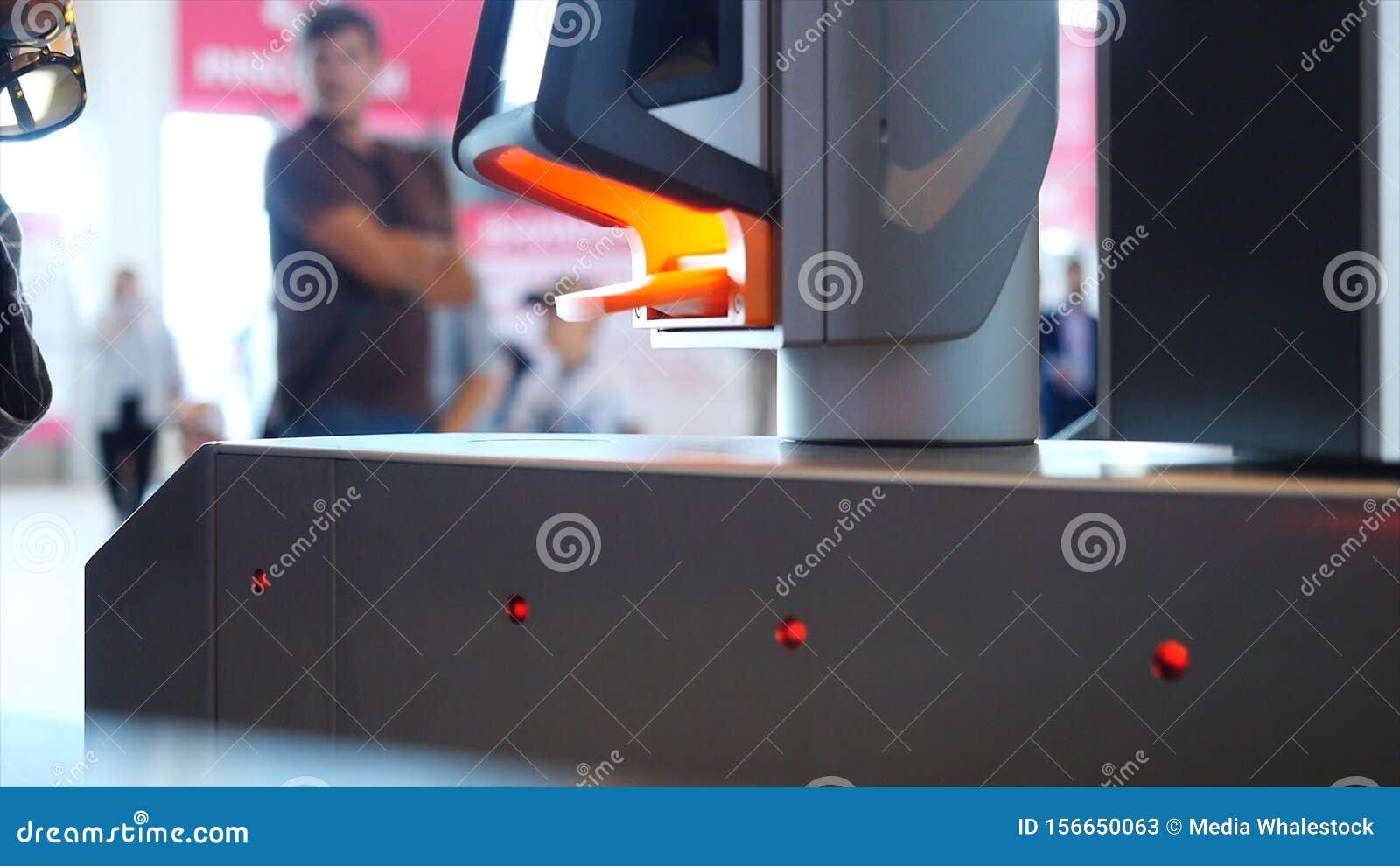 Close-up of People Passing Electronic Turnstile with Barcode Scanner ...