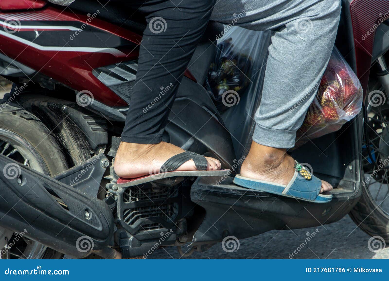 Close-up of People`s Legs Riding a Motorcycle Stock Photo - Image of ...