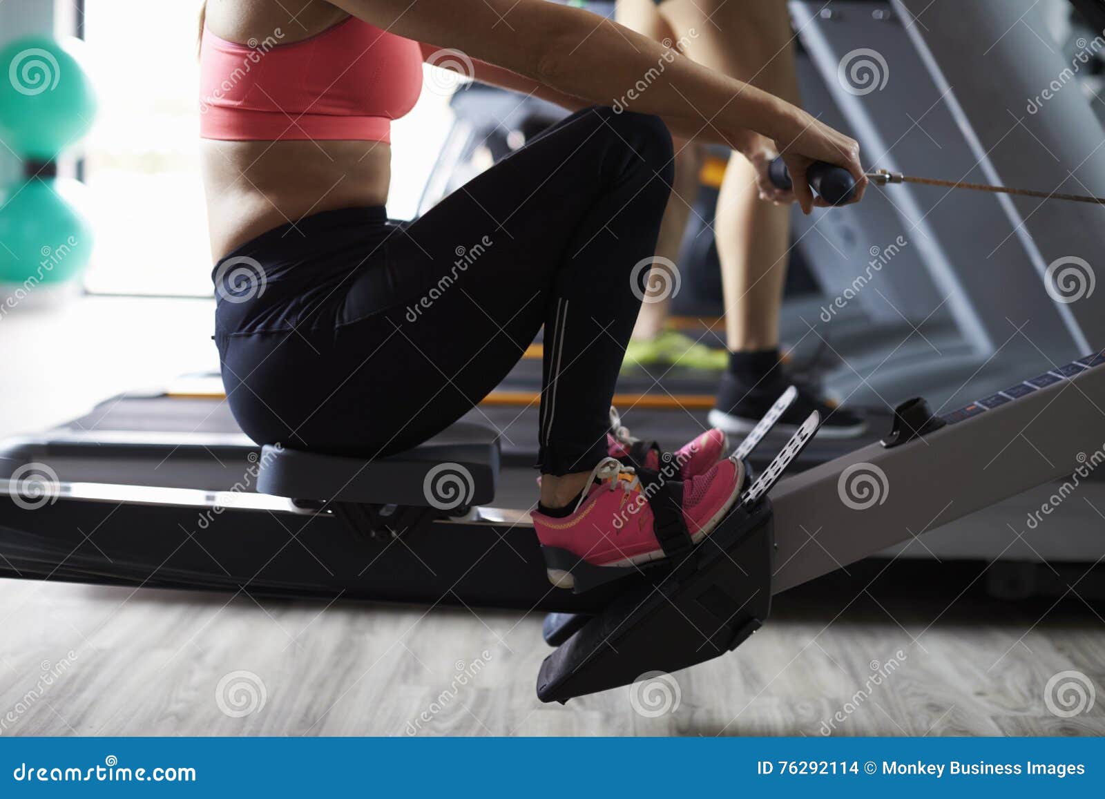 Close Up of People Using Equipment in Busy Gym Stock Photo - Image of ...