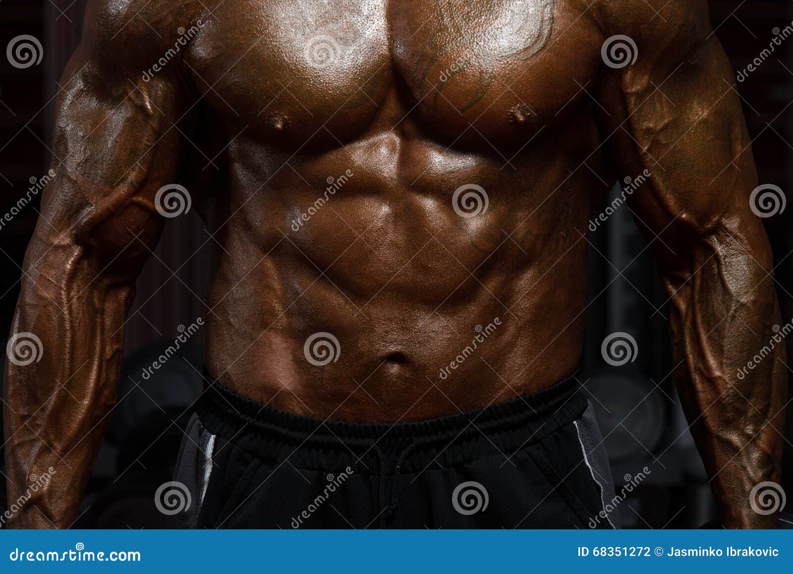 Close Up on Perfect Abs stock photo. Image of dumbbells - 68351272