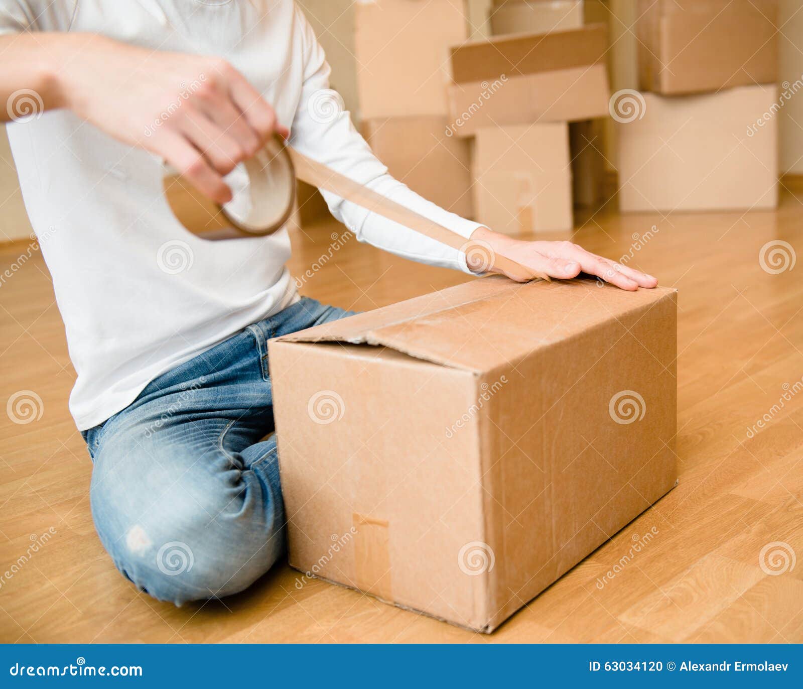 Close Up of Person Hands Packing Cardboard Box Stock Photo - Image of ...