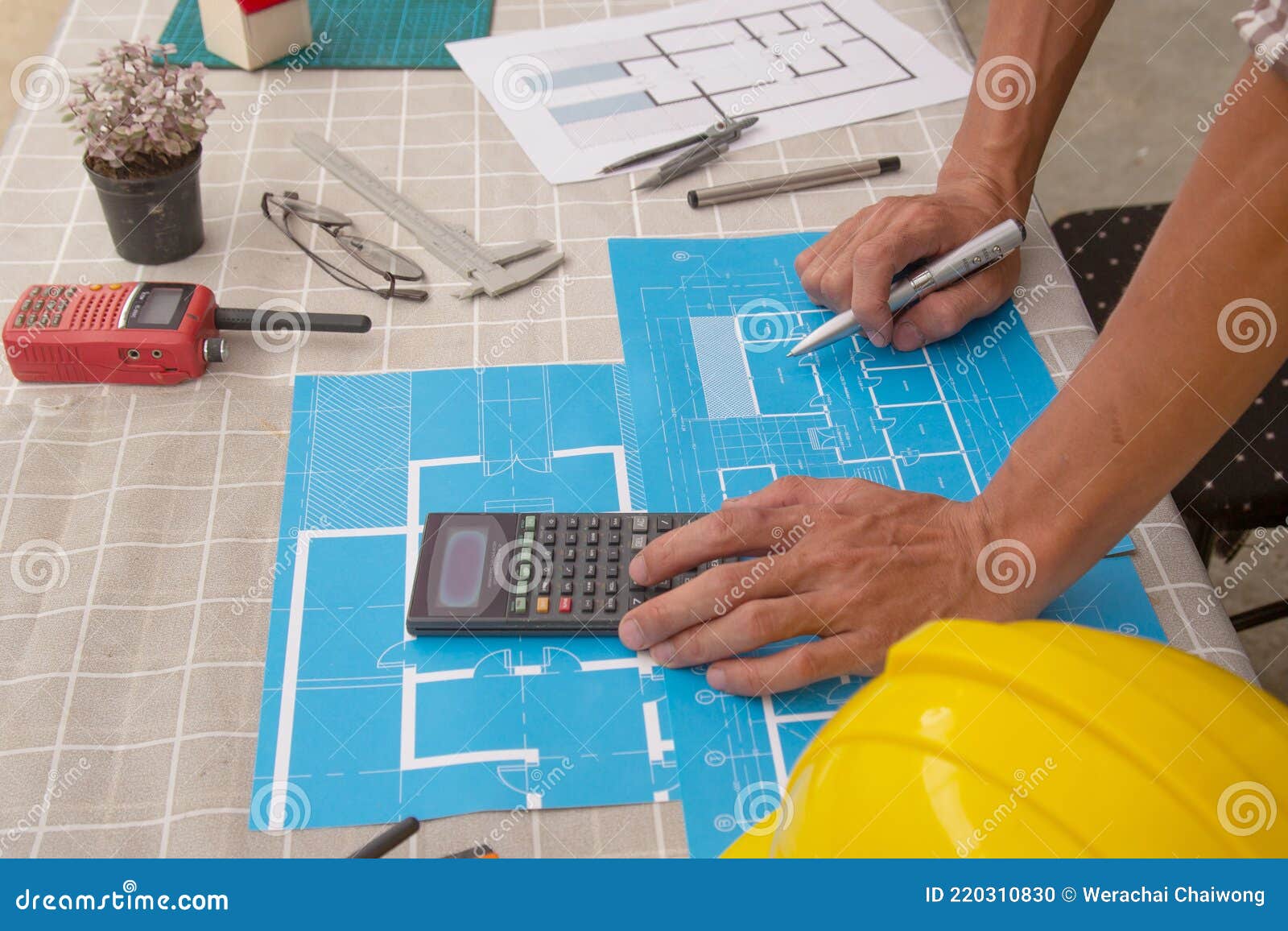 Close-up of Person`s Engineer Hand Drawing Plan on Blue Print with ...