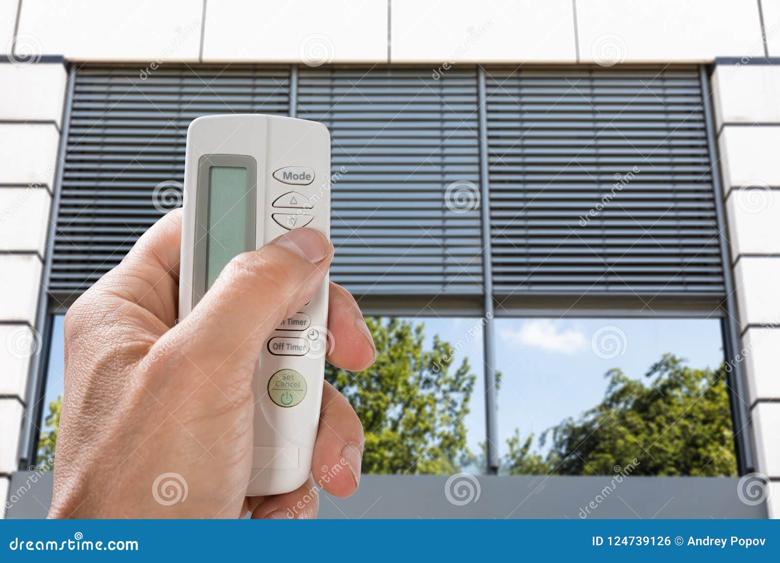 Person Using Remote stock photo. Image of close, exterior - 124739126