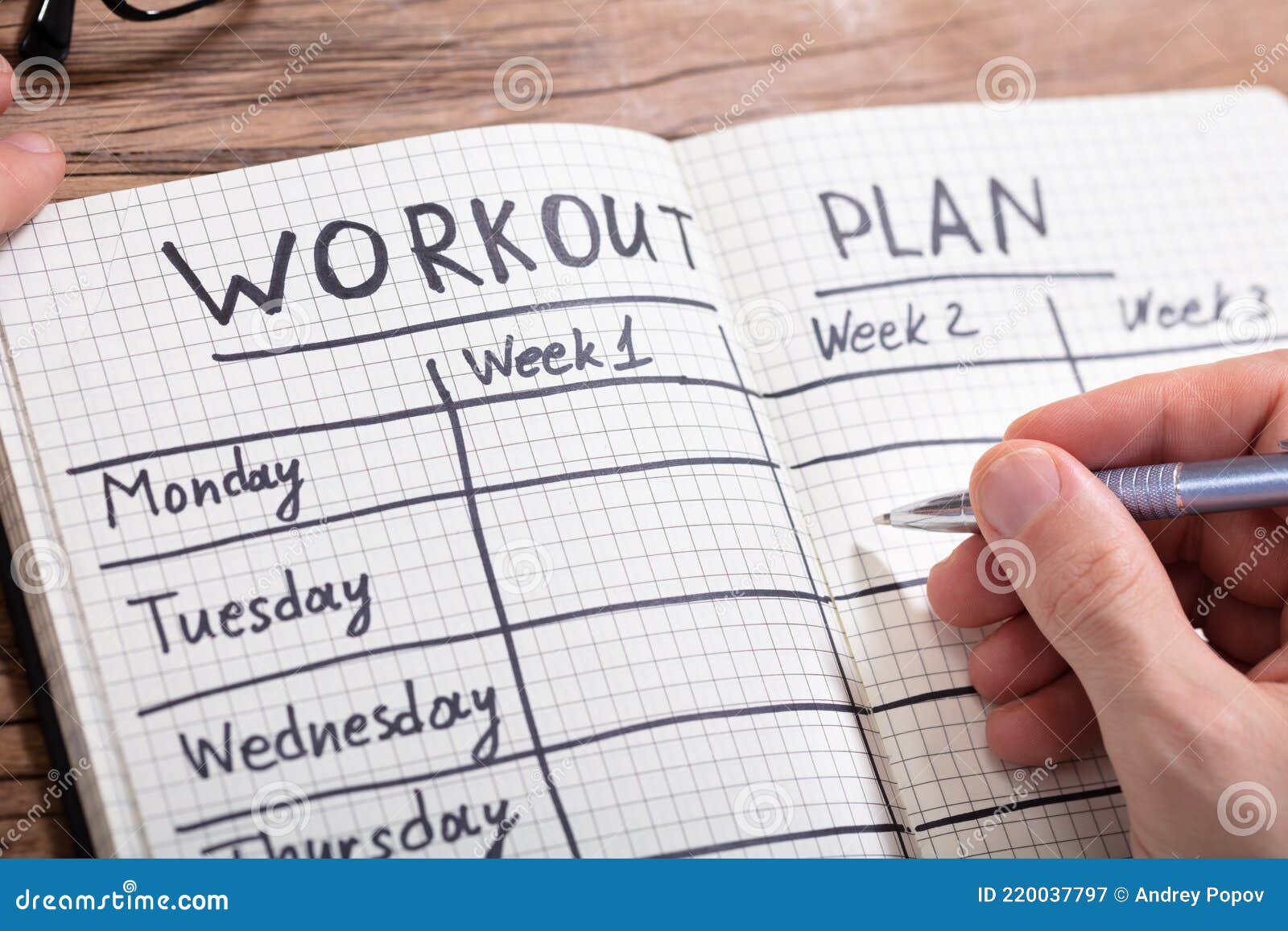 Person Writing Workout Plan in Notebook Stock Image - Image of office ...
