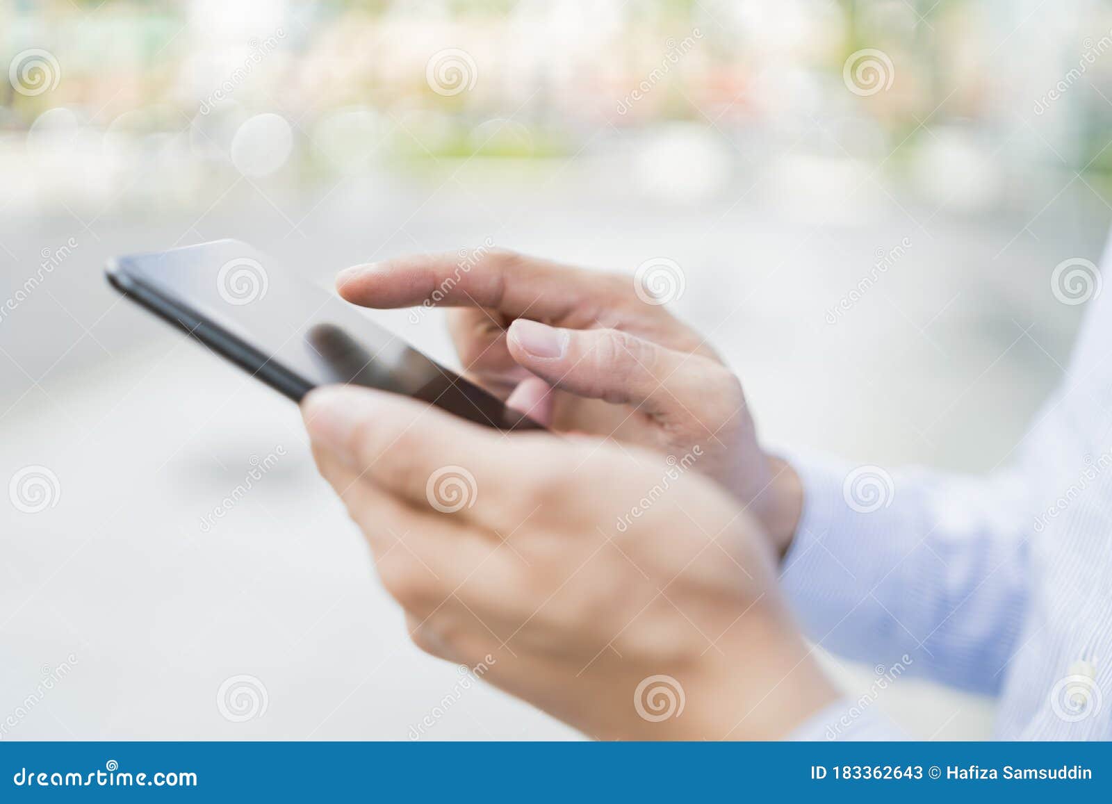 A person using a phone stock image. Image of communication - 183362643