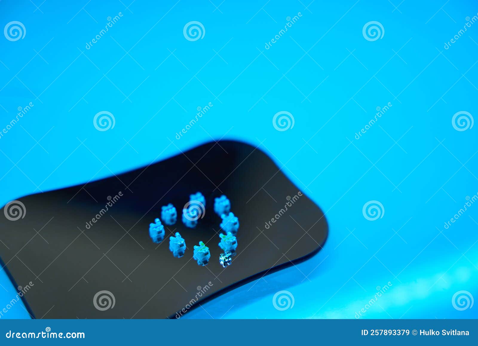 Close Up Photo of Ceramic Staples on Black Plate Stock Image - Image of ...