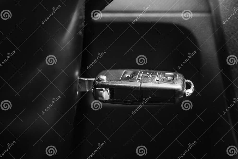 Close Up Photo Inside a Car, Key Inserted into the Lock of Ignition for ...