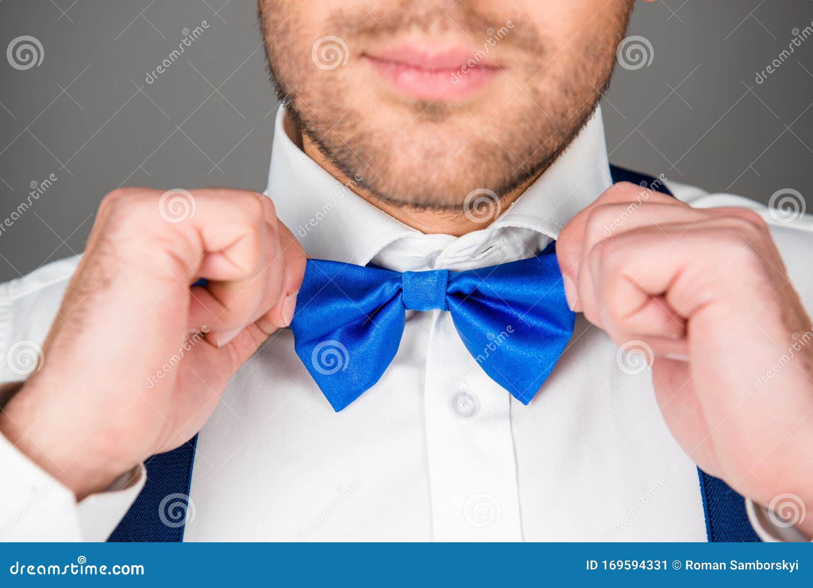 Close Up Photo of Man Correcting His Bow Tie Stock Image - Image of ...