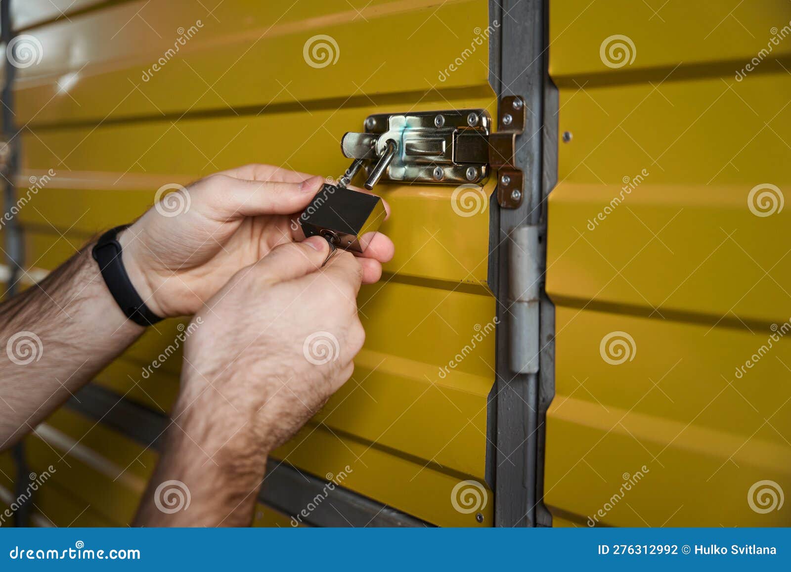 Close-up Photo of Man Hands Opening the Lock Stock Photo - Image of ...