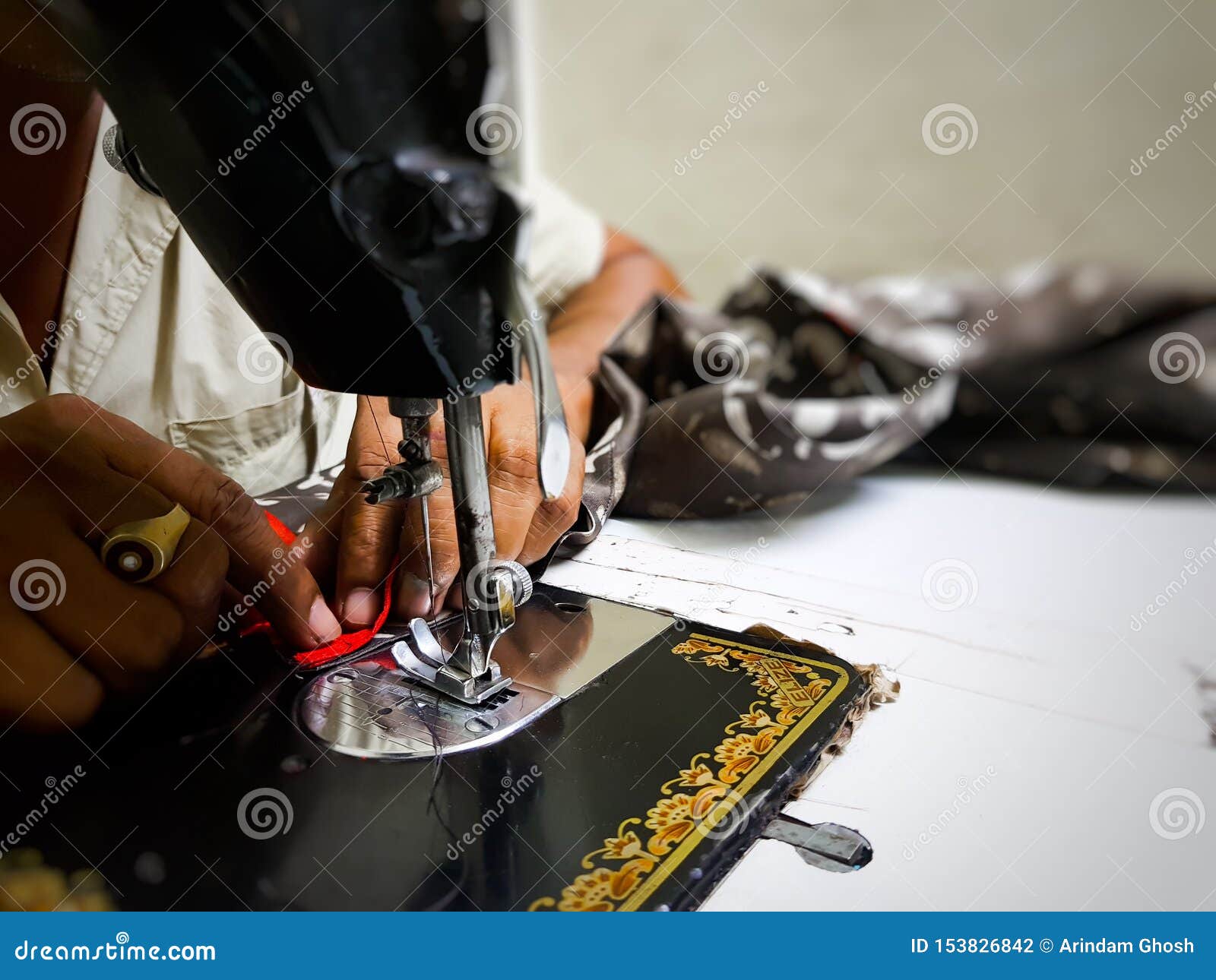 Close Up Photo of Manual Sewing Machine with Tailor Hands Stitching Red ...