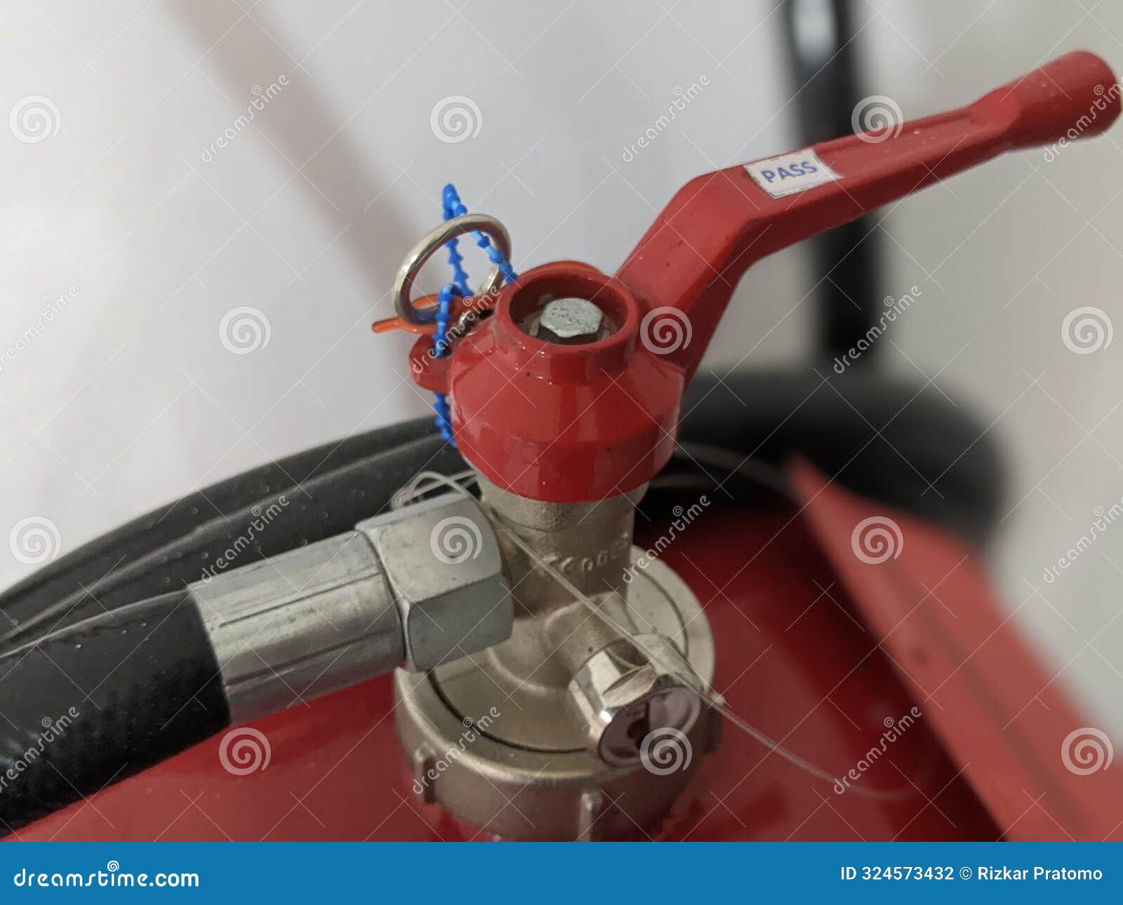 Close-up Photo of the Tap on a Light Fire Extinguisher Stock Photo ...