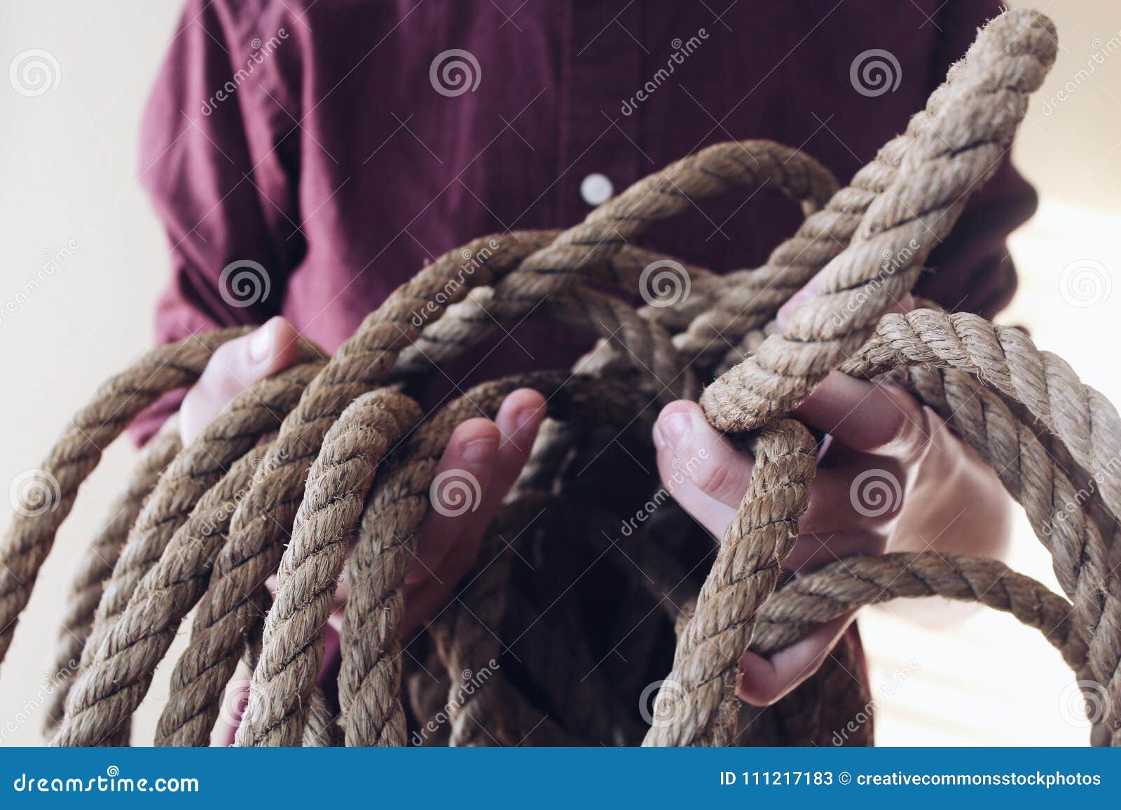 Close-up Photography Of Man Holding A Rope Picture. Image: 111217183