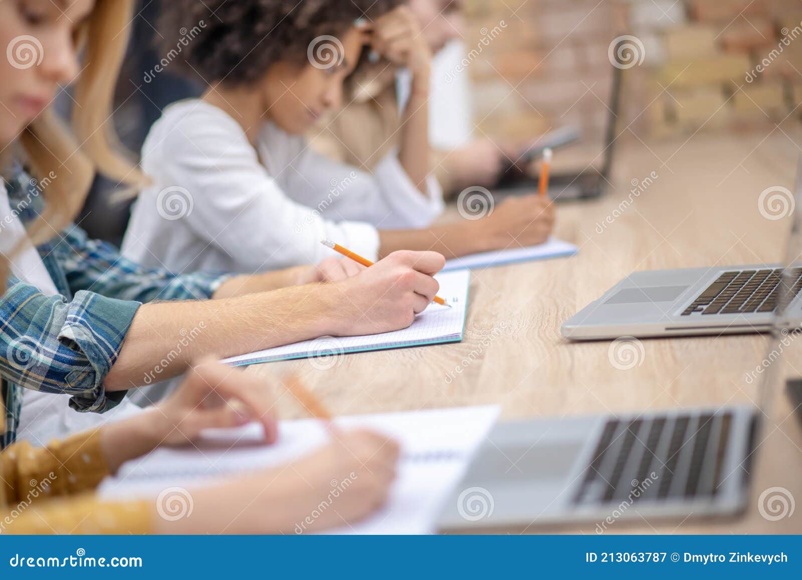 Close Up Picture of Students Making Notes during the Lecture Stock ...