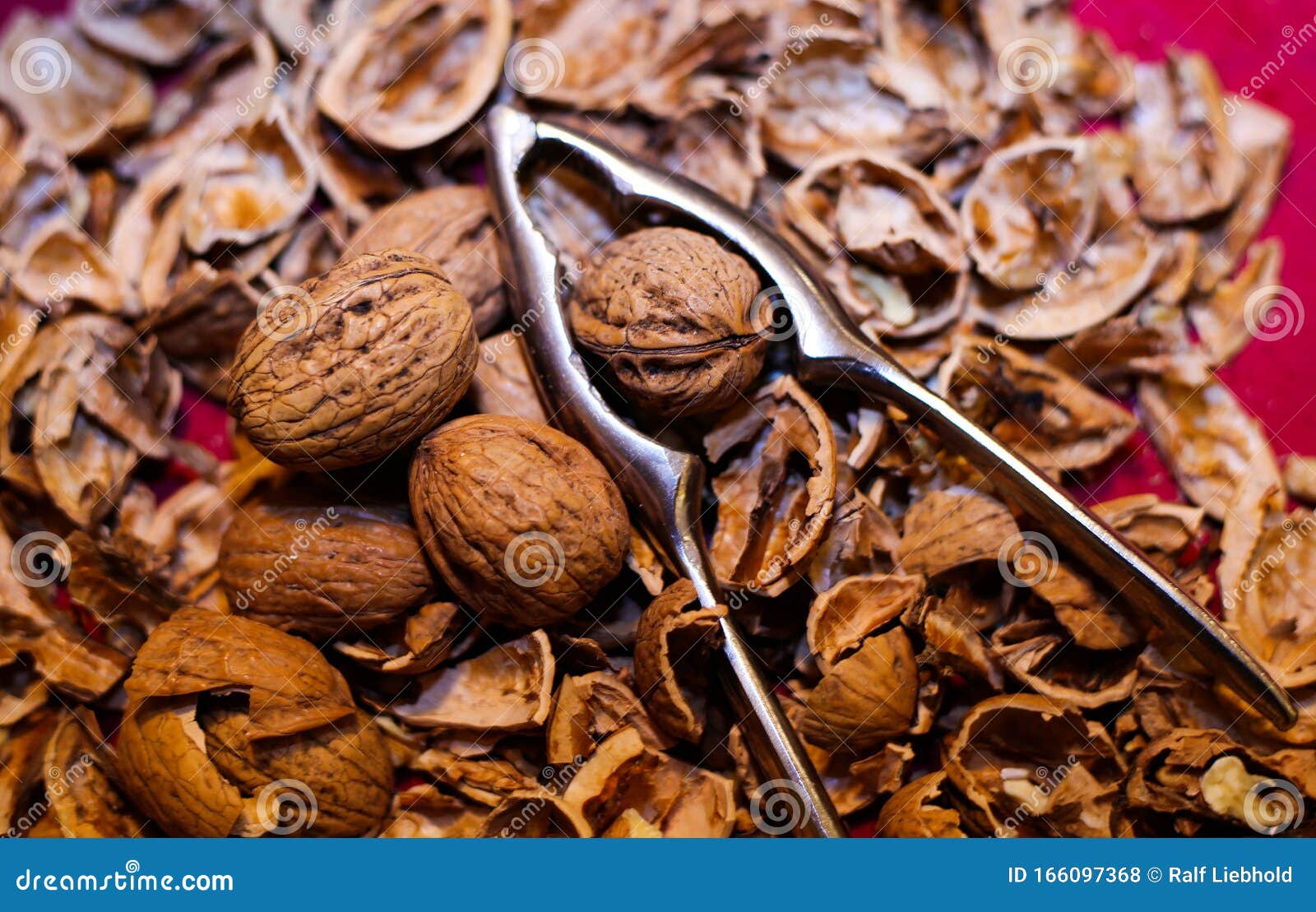 Close Up Pile with Cracked Walnut Shells and Isolated Retro Lever ...