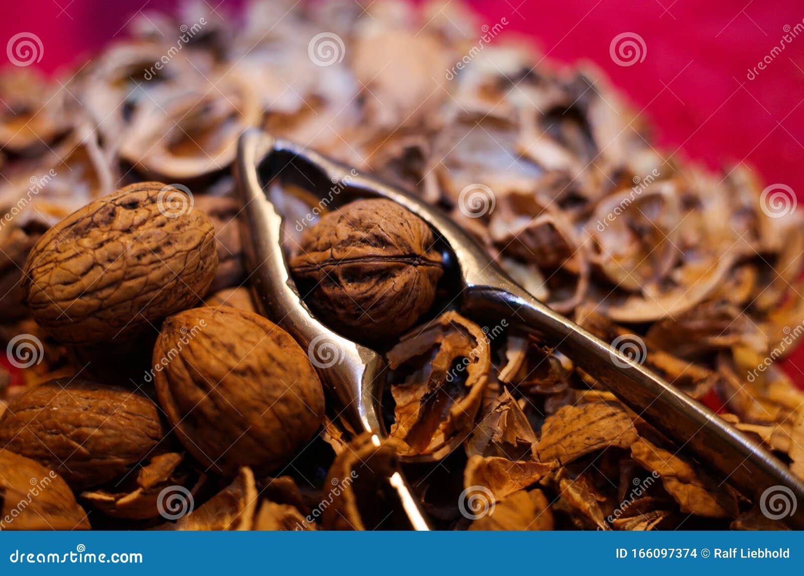 Close Up Pile with Cracked Walnut Shells and Isolated Retro Lever ...