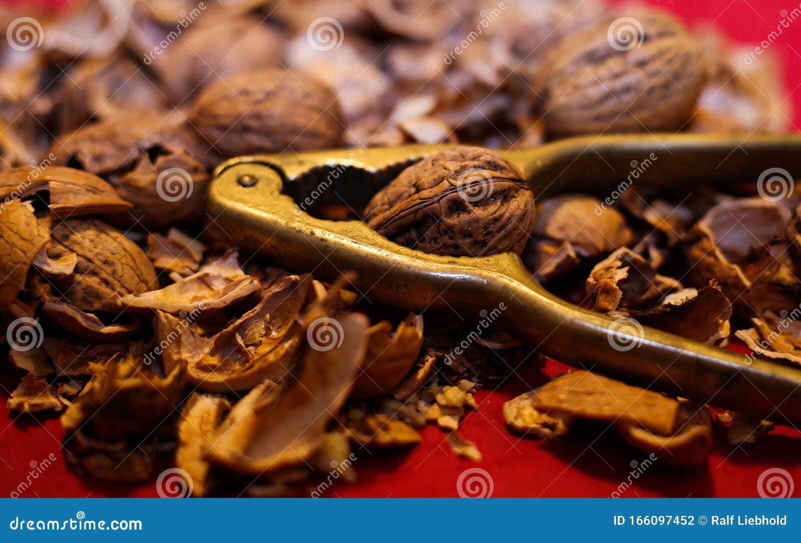 Close Up Pile with Cracked Walnut Shells and Isolated Retro Lever ...