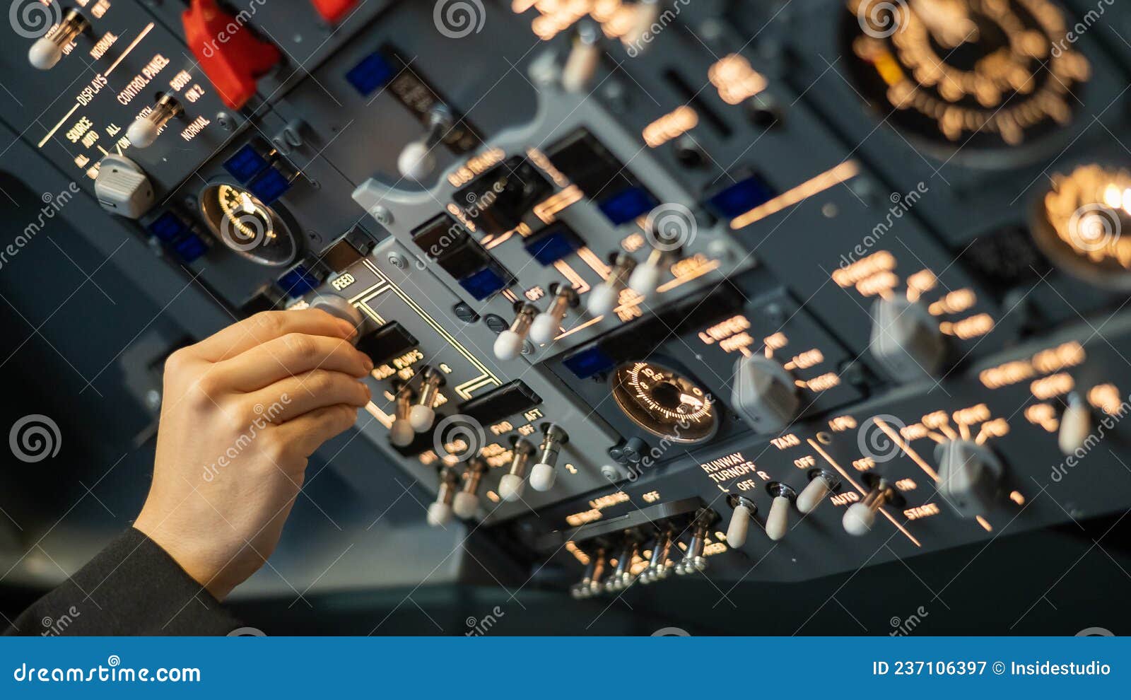 Close-up of a Pilot& X27;s Hand Turning a Toggle Switch on the Control ...