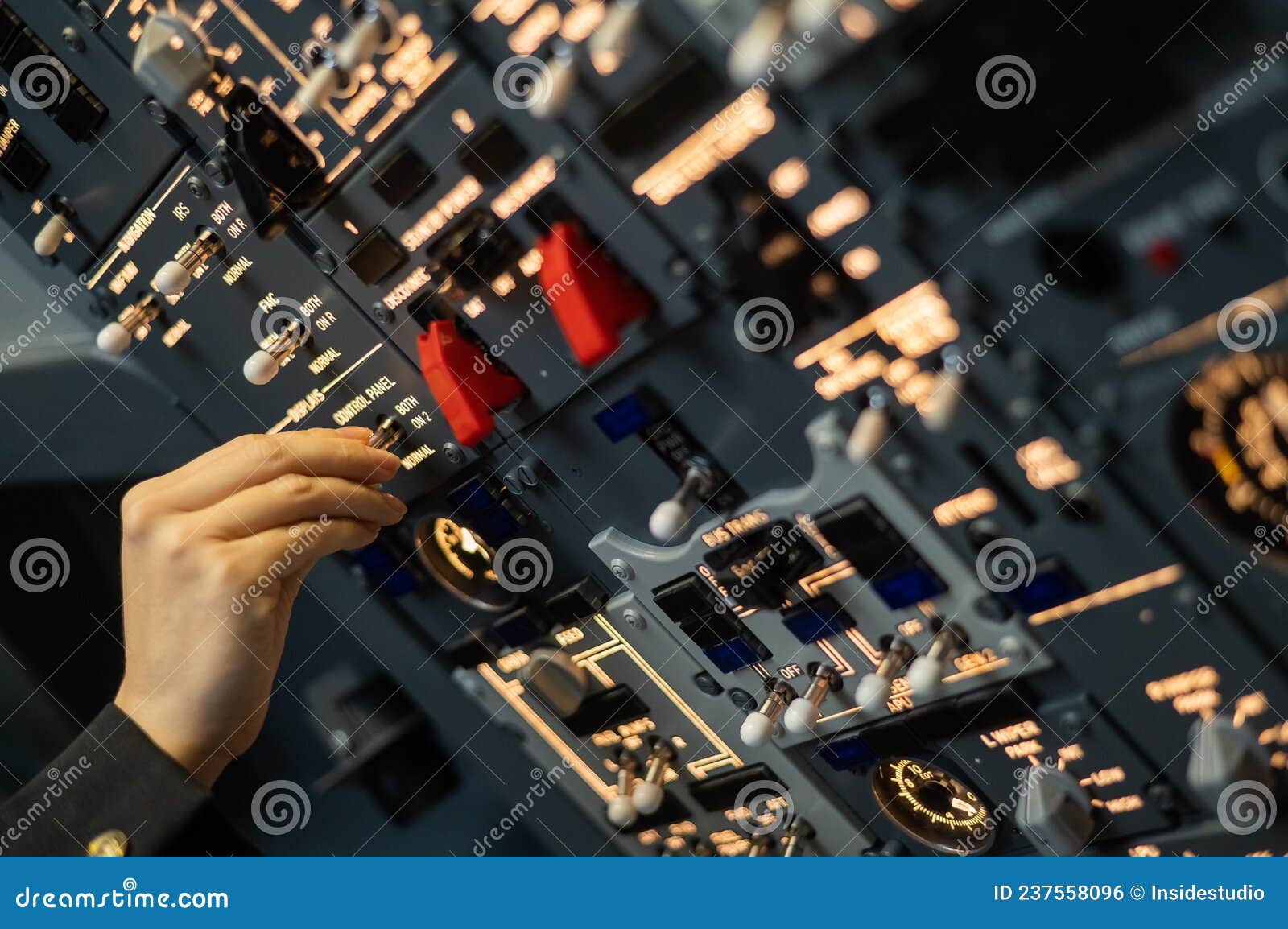 Close-up of a Pilot& X27;s Hand Turning a Toggle Switch on the Control ...