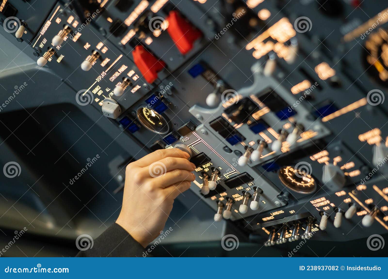 Close-up of a Pilot& X27;s Hand Turning a Toggle Switch on the Control ...