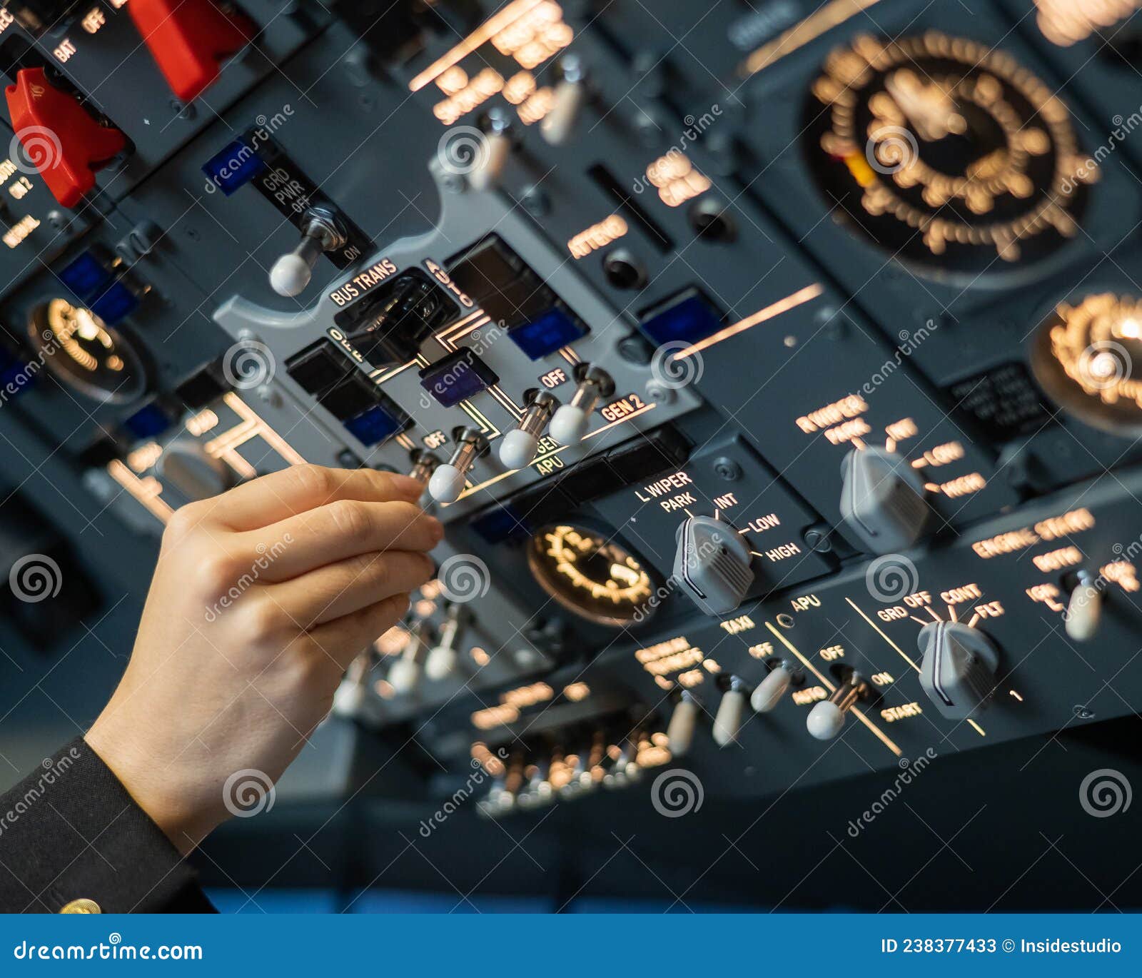 Close-up of a Pilots Hand Turning a Toggle Switch on the Control Panel ...