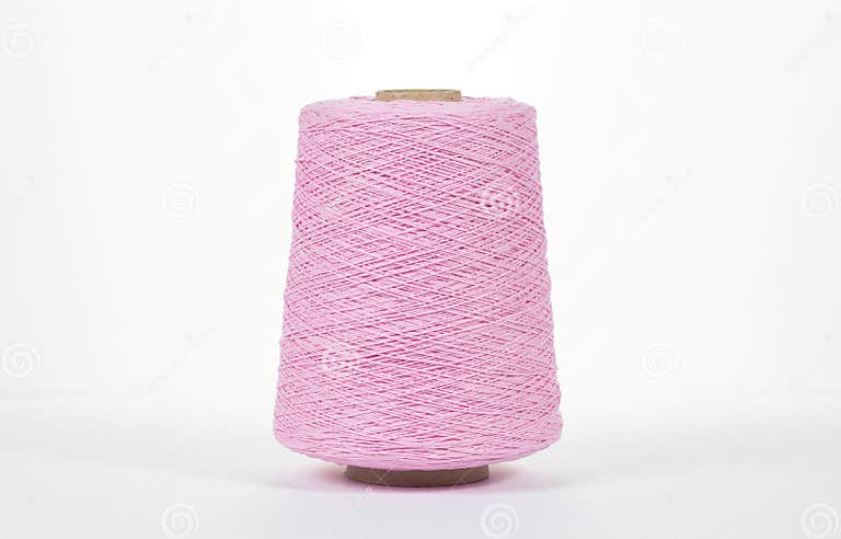 Close-up of a Pink Bobbin with Cotton Thread on a White Background ...
