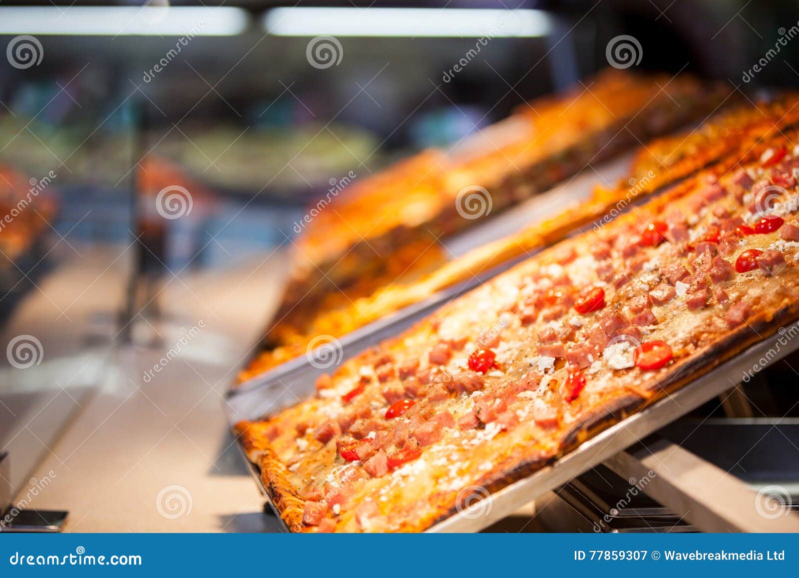 Close-up of Pizza in Display Stock Image - Image of market, store: 77859307