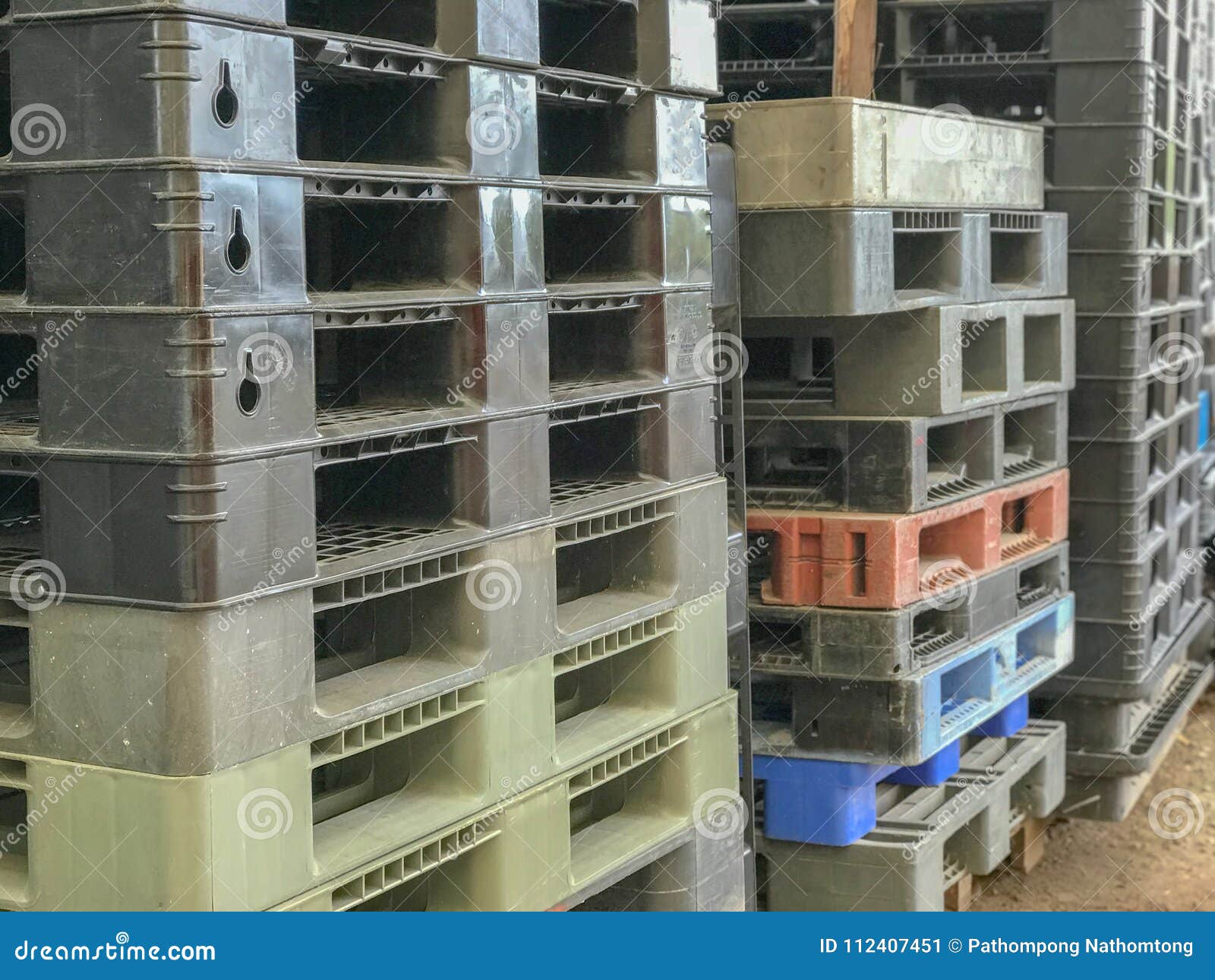 Plastic Pallets Stacked in a Warehouse Stock Image - Image of bottle ...