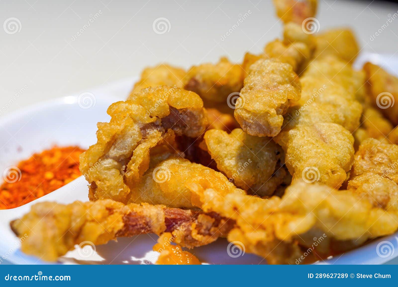 Close-up of a Plate of Delicious Little Crispy Meat Stock Image - Image ...