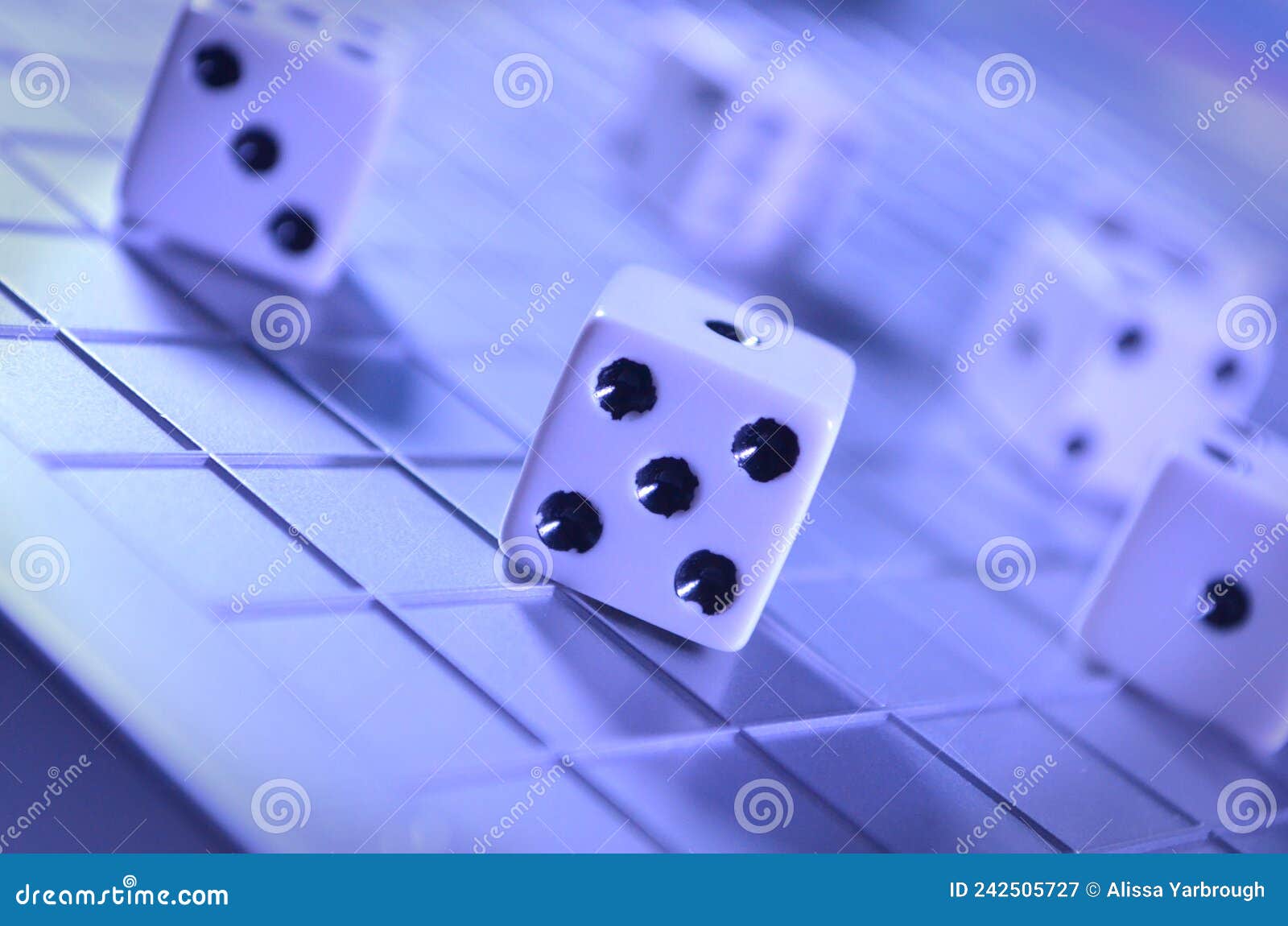 Playing Dice on a Grid in Blue Lighting, Rolling Die Stock Image ...