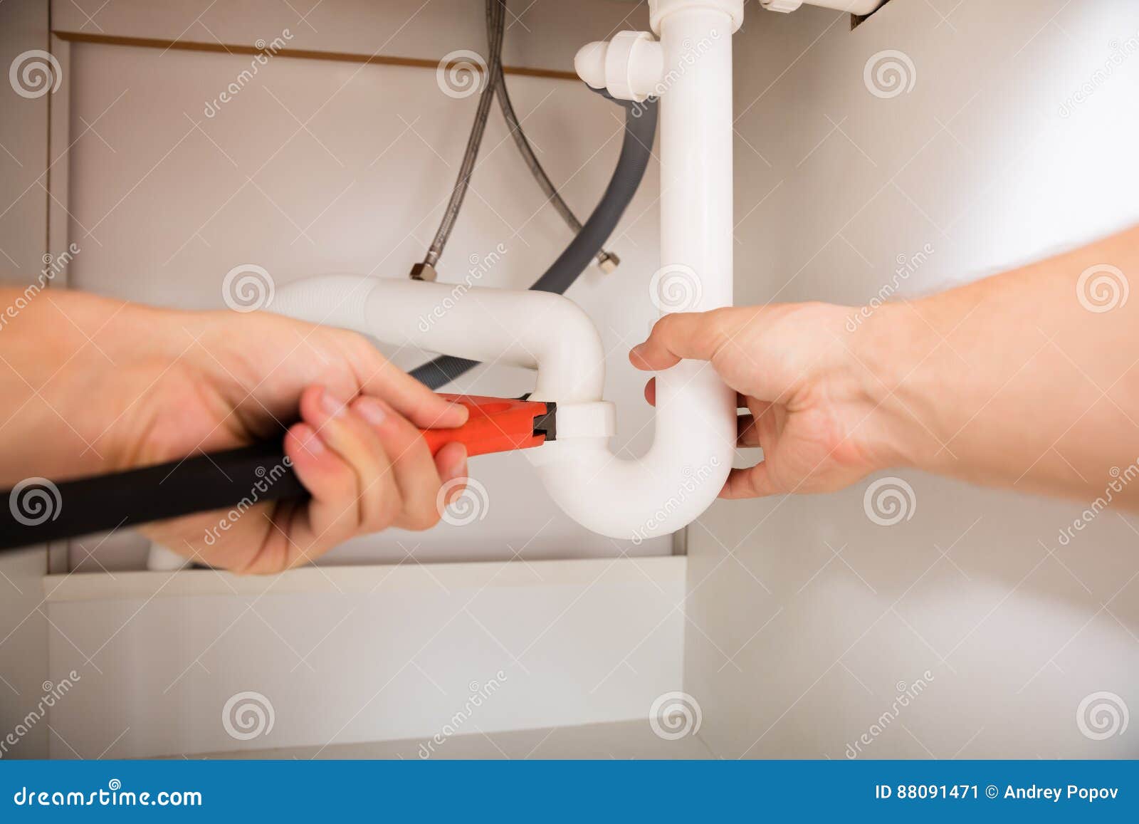 Close-up of Plumber Fixing Sink Pipe Stock Image - Image of laborer ...
