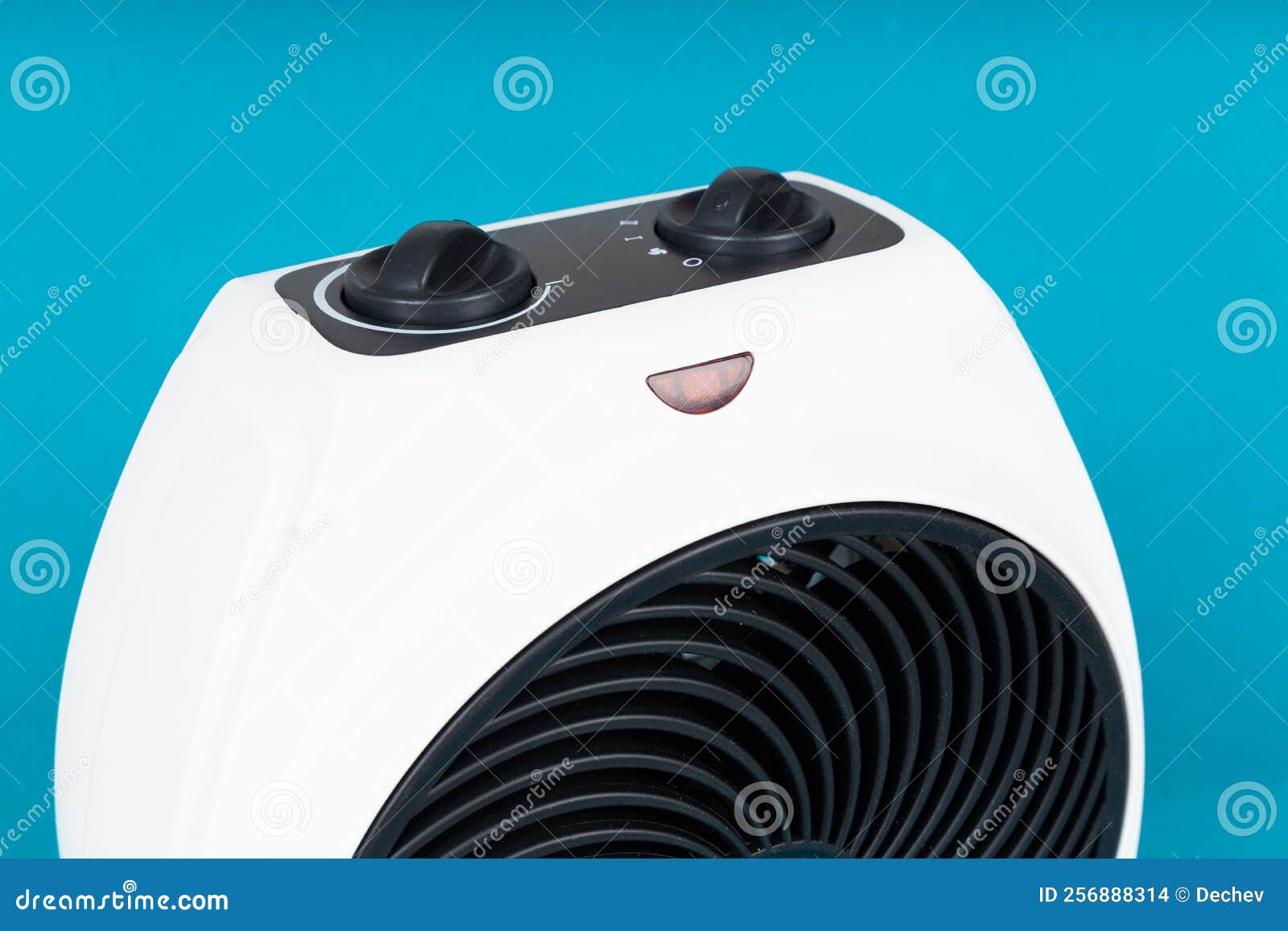 Close Up of Portable Electric Heater. Blue Background Stock Photo ...