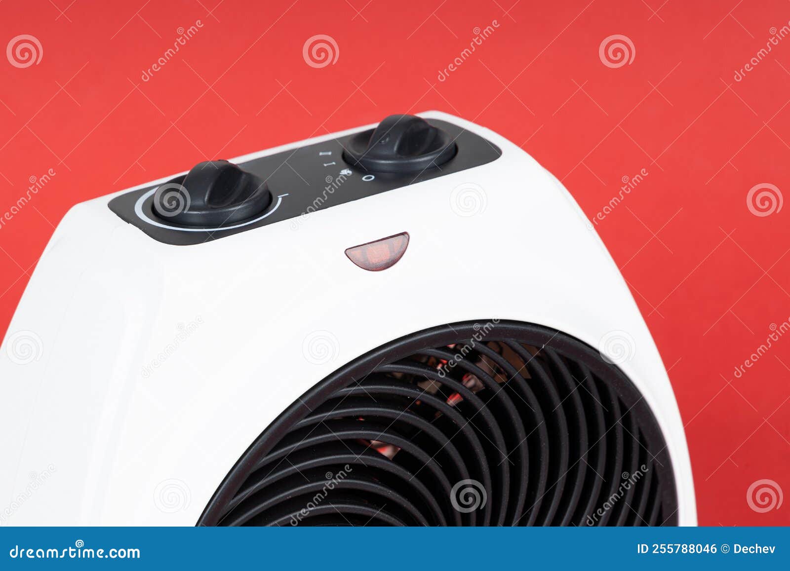 Close Up of Portable Electric Heater. Red Background Stock Photo ...