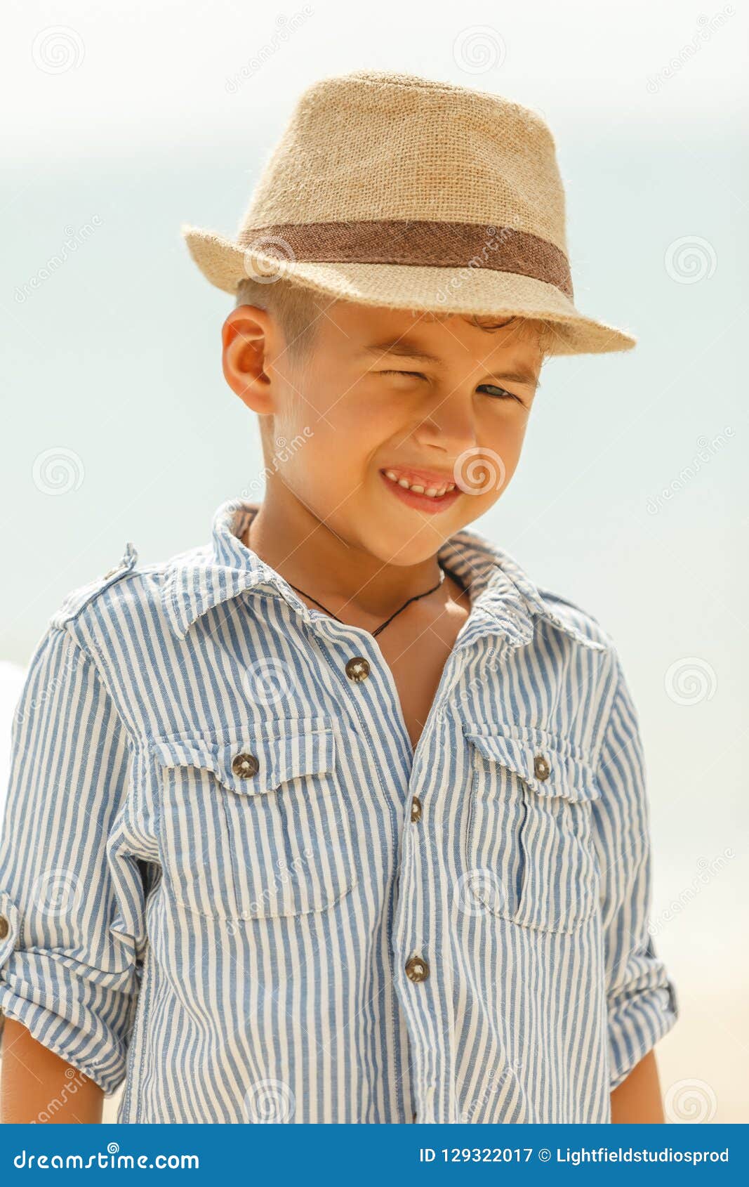 Close-up Portrait of Adorable Boy Winking at Camera Stock Image - Image ...