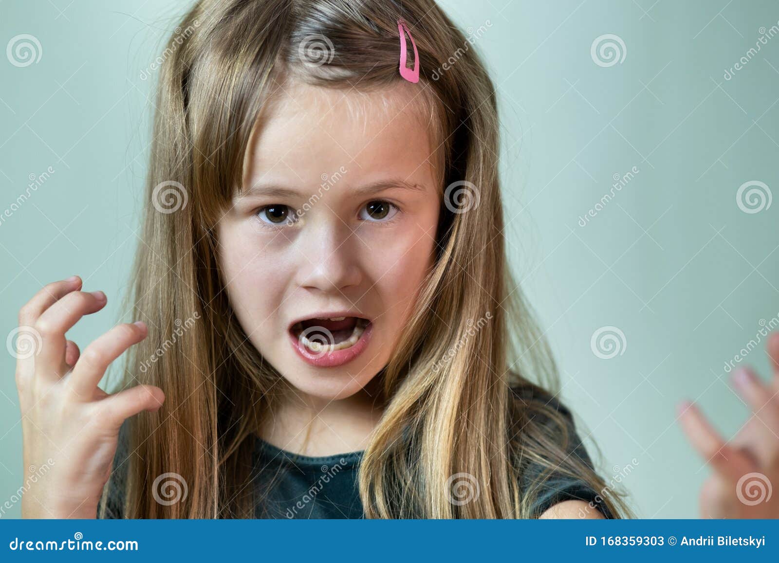 Close Up Portrait of Angry Shouting Child Girl Looking Aggressively in ... Close Up Portrait of Angry Shouting Child Girl Looking Aggressively in ...