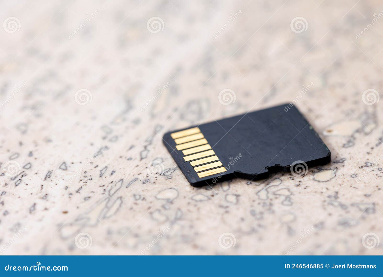 A Close Up Portrait of the Back of a Black Micro SD Card Lying on a ...