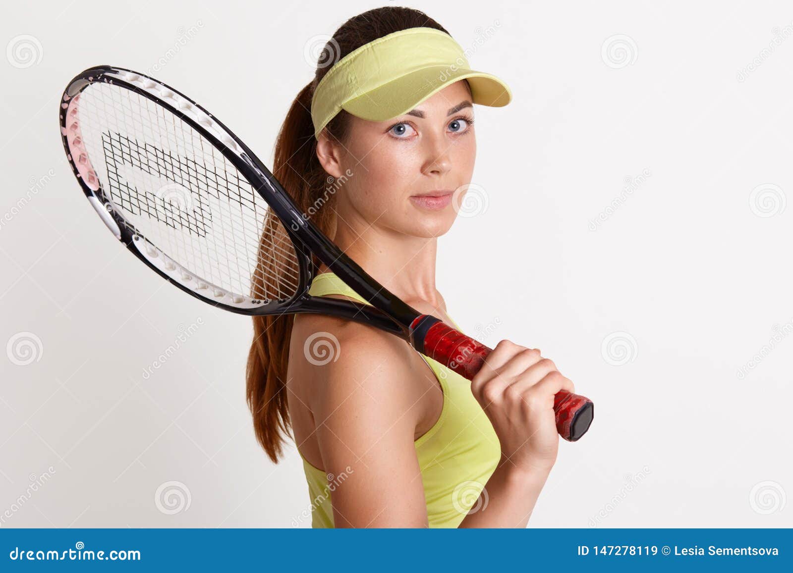 Close Up Portrait Of Beautiful Energetic Strong Tennis Player Looking Directly At Camera
