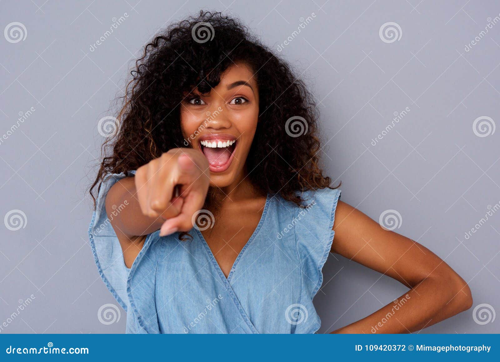Close Up Beautiful Young Black Woman Laughing And Pointing Finger Stock