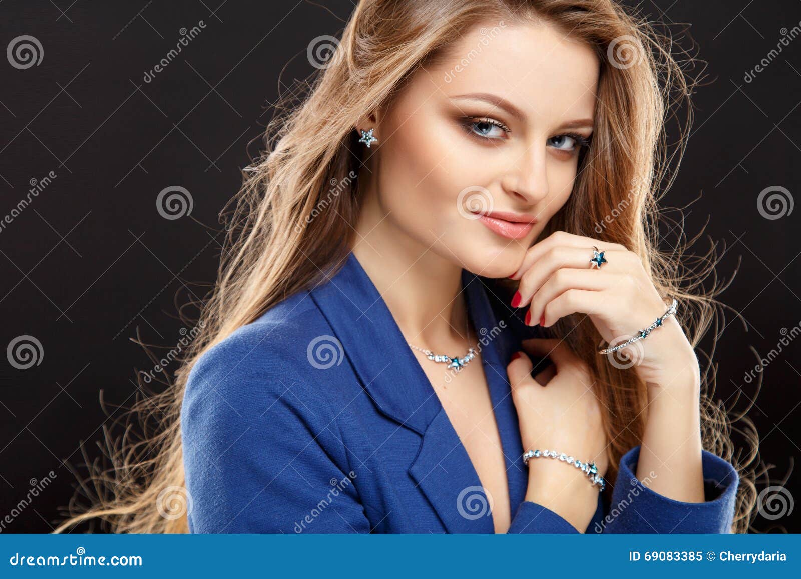 Close Up Portrait Of Beautiful Young Woman With Luxury Jewelry And