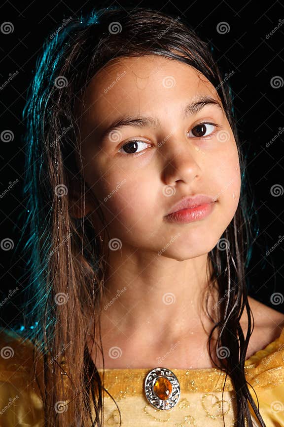 Dark Haired Brown Eyed Teenage Girl Posing In A Black Aqua Zone Stock