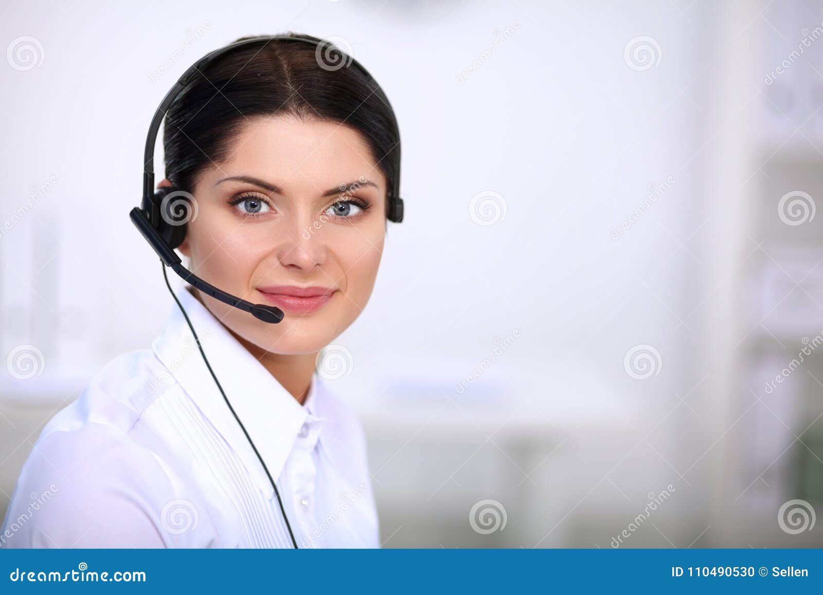 Close-up Portrait of a Customer Service Agent Sitting at Office Stock ...