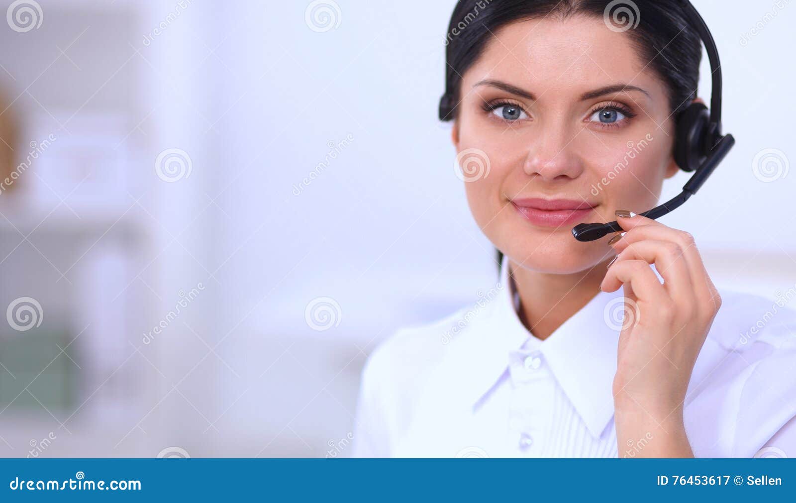 Close-up Portrait of a Customer Service Agent Sitting at Office Stock ...
