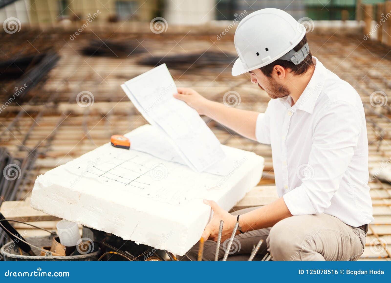 Portrait of Engineer Reading Plans on Construction Site Stock Photo ...